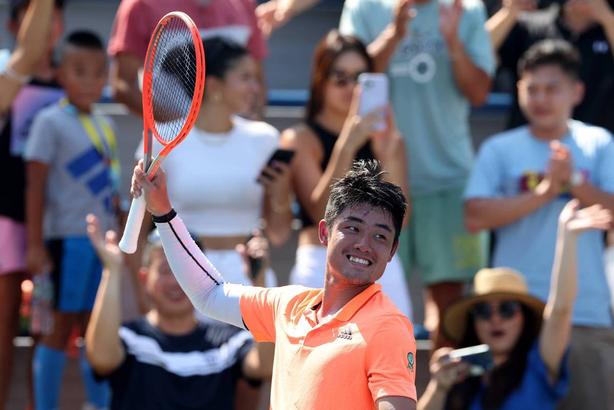 Chinese men's player makes historic Grand Slam win - Asia News ...
