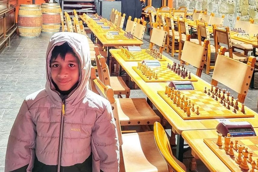 8-year-old boy who lives in Singapore becomes youngest chess player to ...
