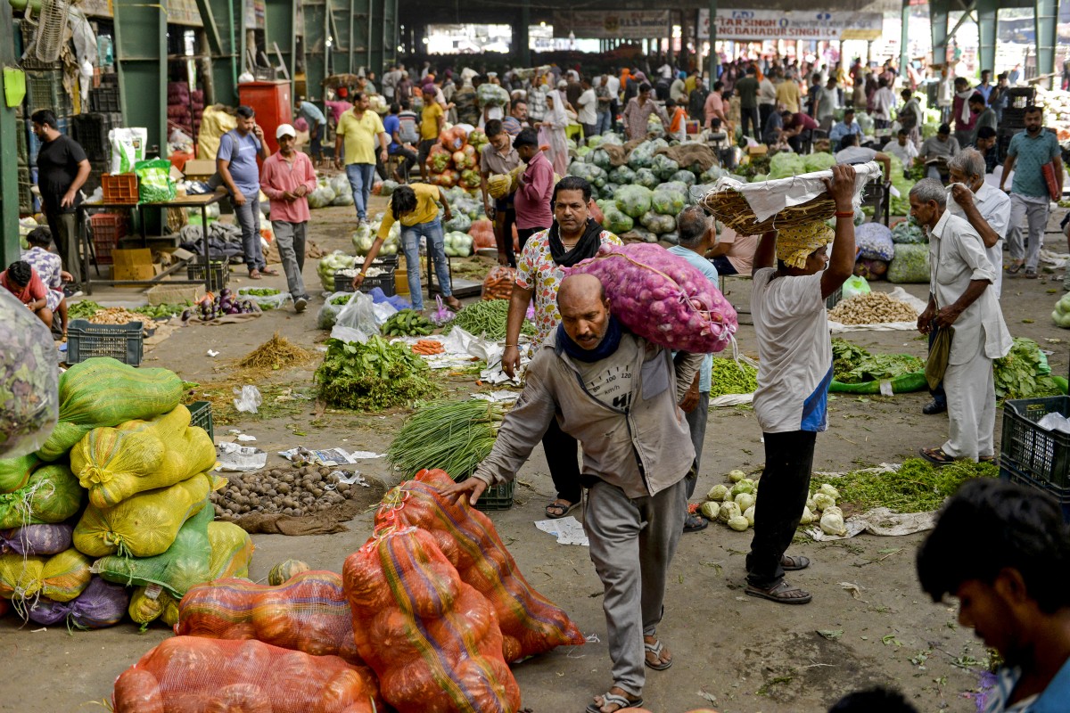 India’s retail inflation slips to eight-year low of 1.55% in July - Asia News NetworkAsia News ...